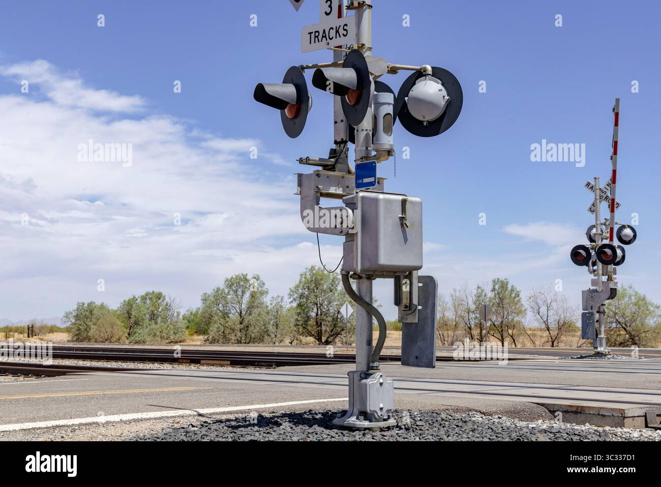 Remote railroad crossing desert environment Stock Photo - Alamy