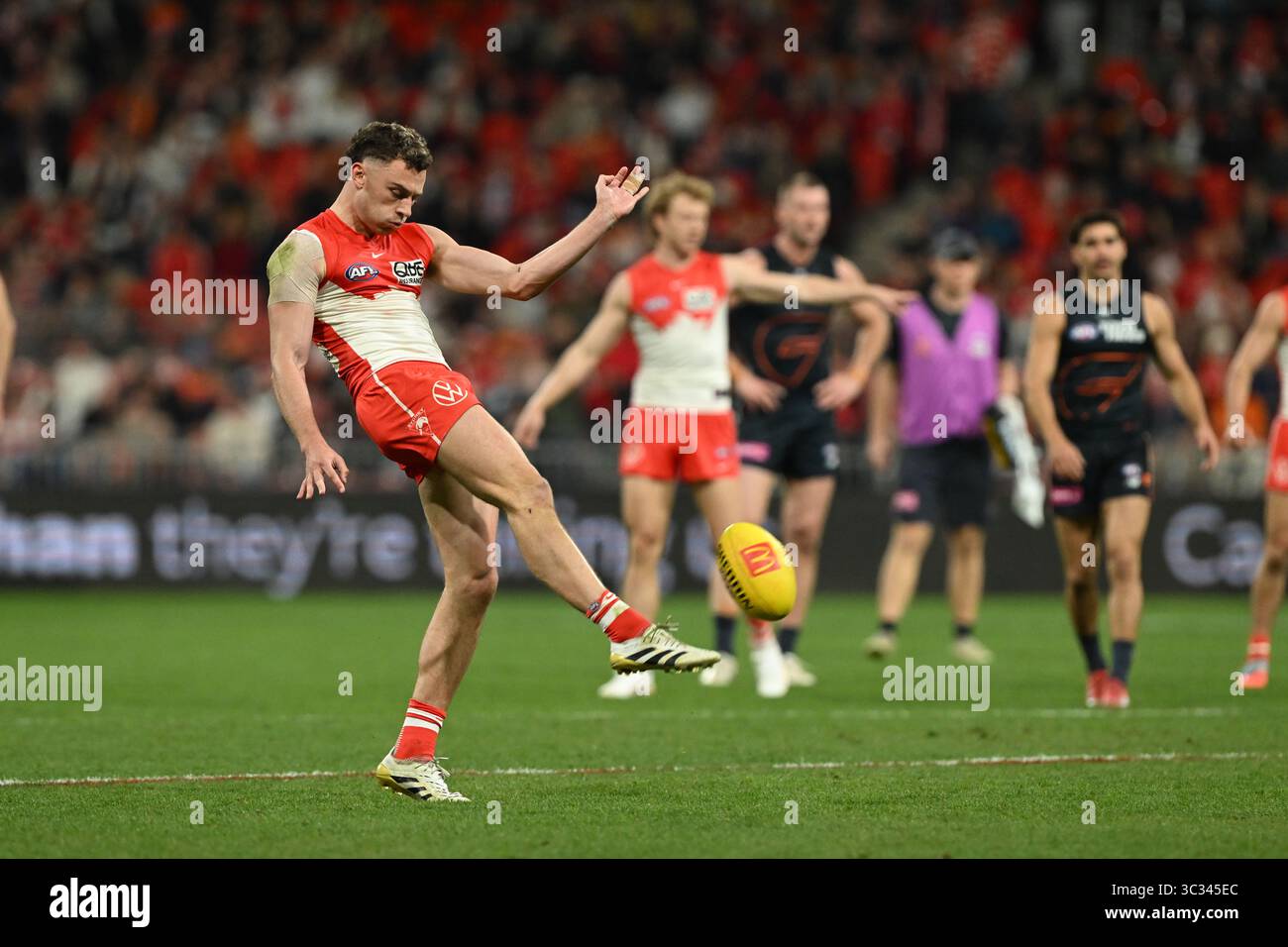 Will Hayward of the Swans kicks a goal during the AFL Round 20 match ...