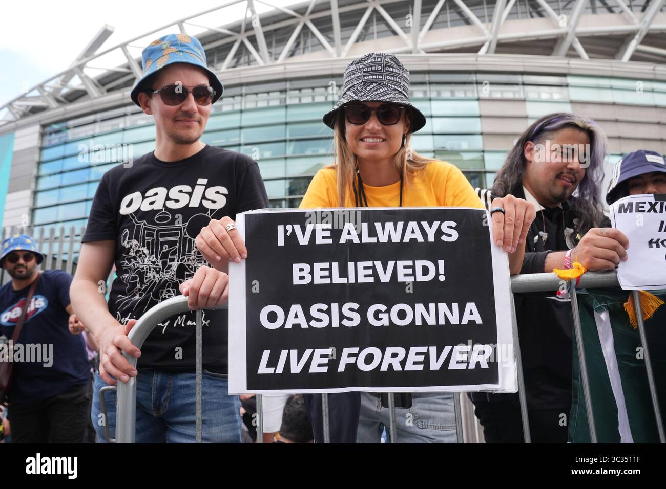 Oasis fans outside the stadium ahead of the first night of the Oasis ...