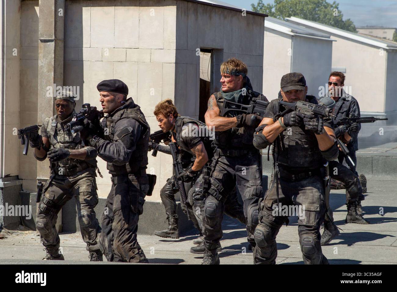 Arnold schwarzenegger with jason statham hi-res stock photography and ...