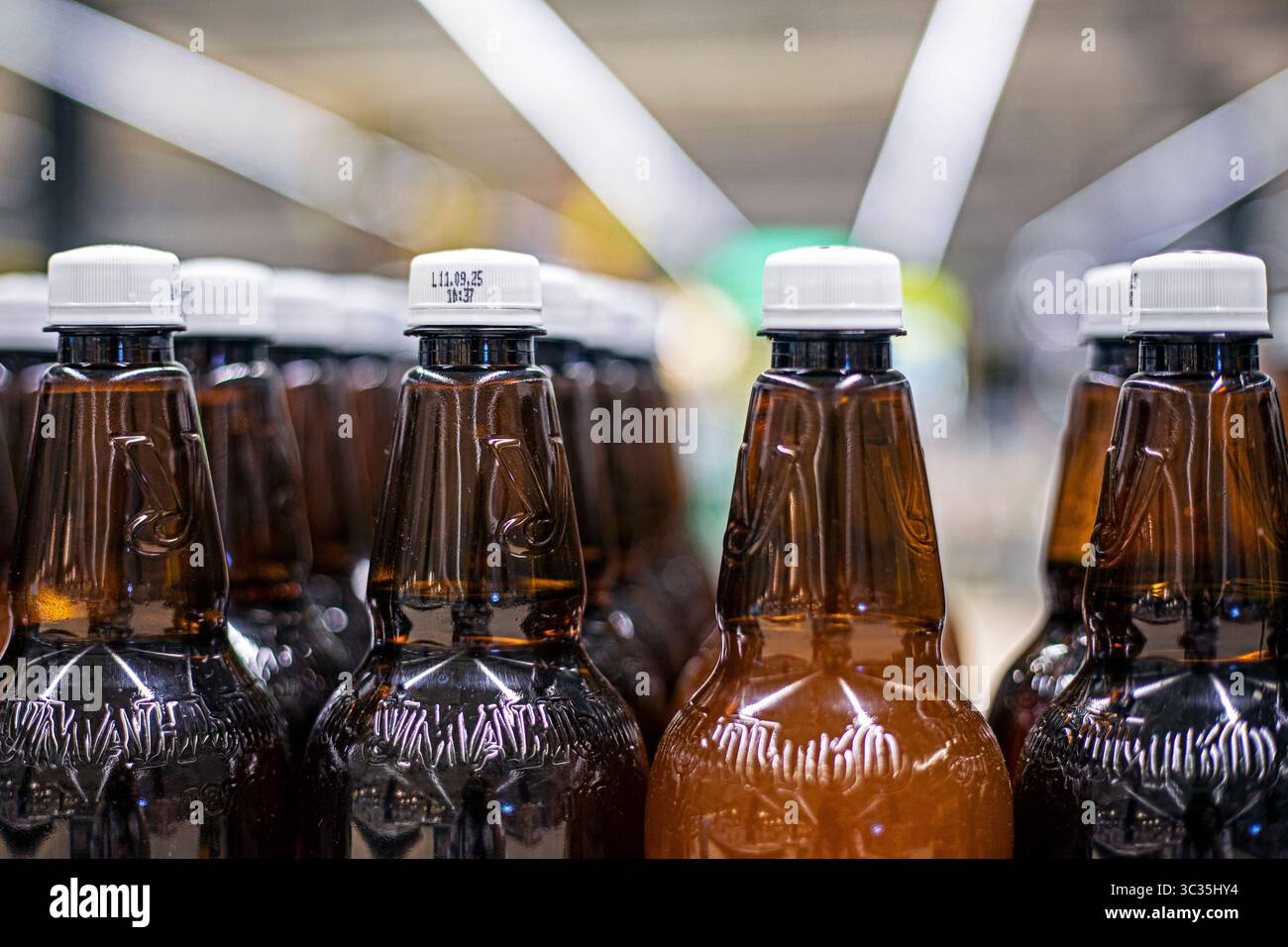 carbonated drinks, beer in brown plastic tetra packs in the supermarket ...