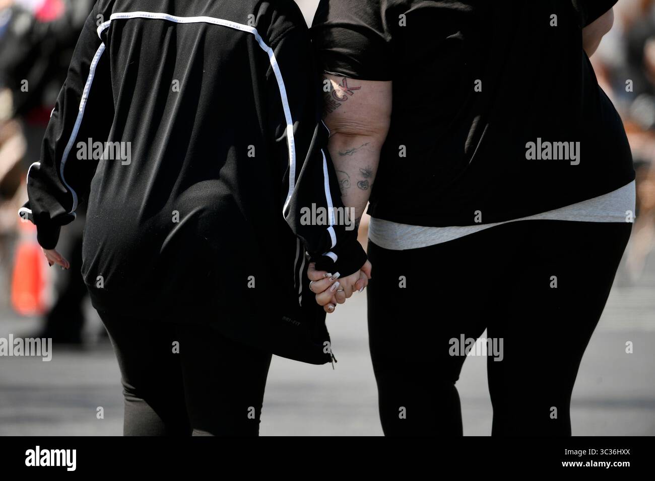 Apr 7, 2021 - Boulder, Colorado, USA - Tabitha Cook, right, holds hands ...