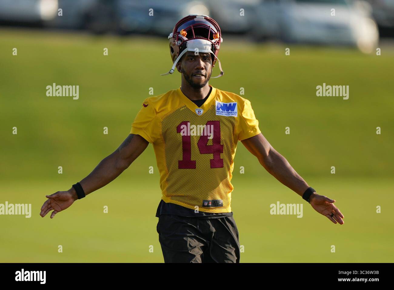 Washington Commanders quarterback Josh Johnson (14) arrives for ...