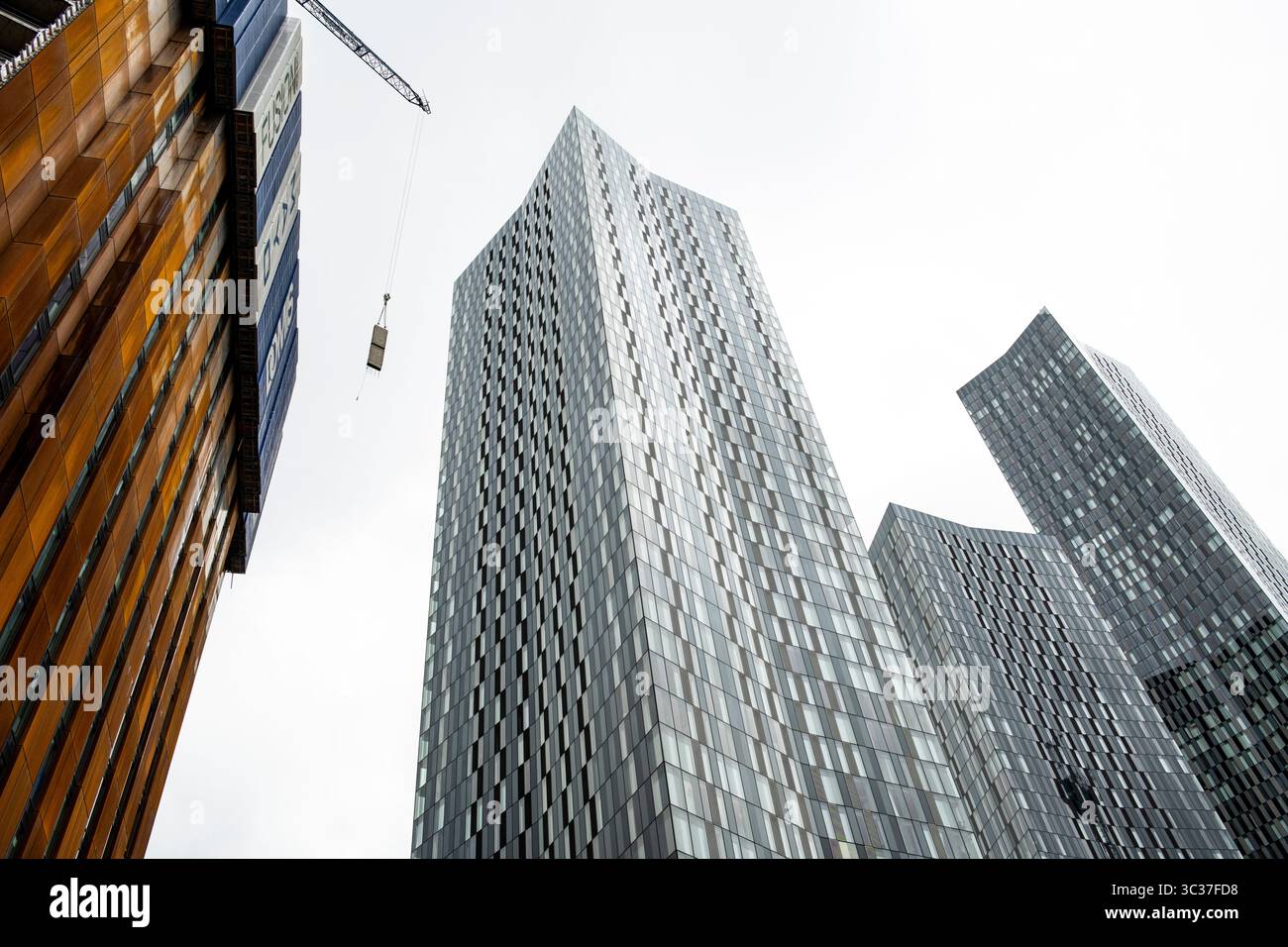 Tower blocks at Deansgate Square, Deansgate, Manchester, UK. Against a ...