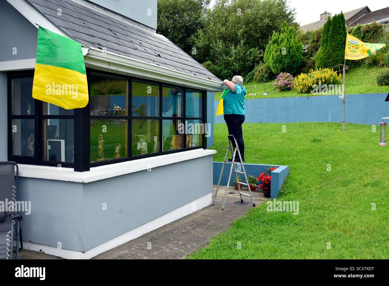 Ardara, County Donegal, Ireland. 25th July 2025. Flags flying in ...