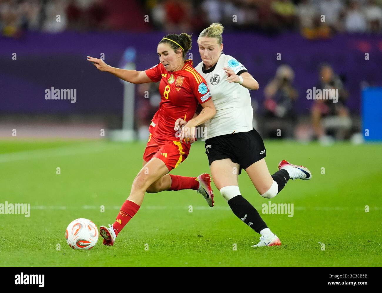 Spain's Mariona Caldentey (left) and Germany's Franziska Kett battle ...