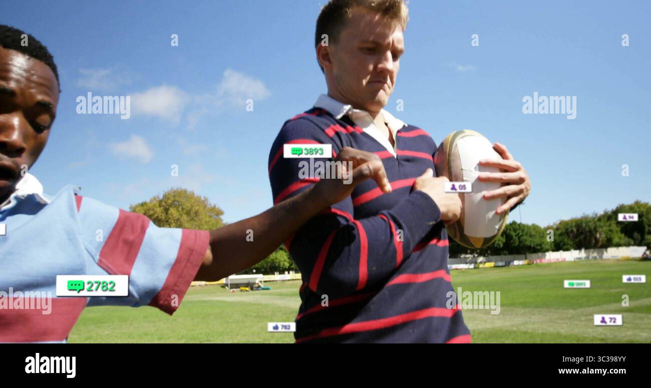 Charging player wearing rugby jersey holding ball on rugby field, with ...