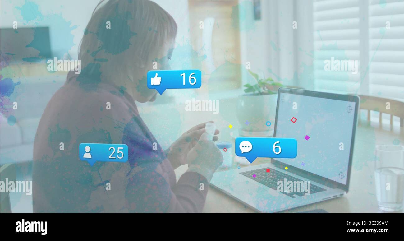 Tapping smartphone mature woman using laptop at home window-side table ...