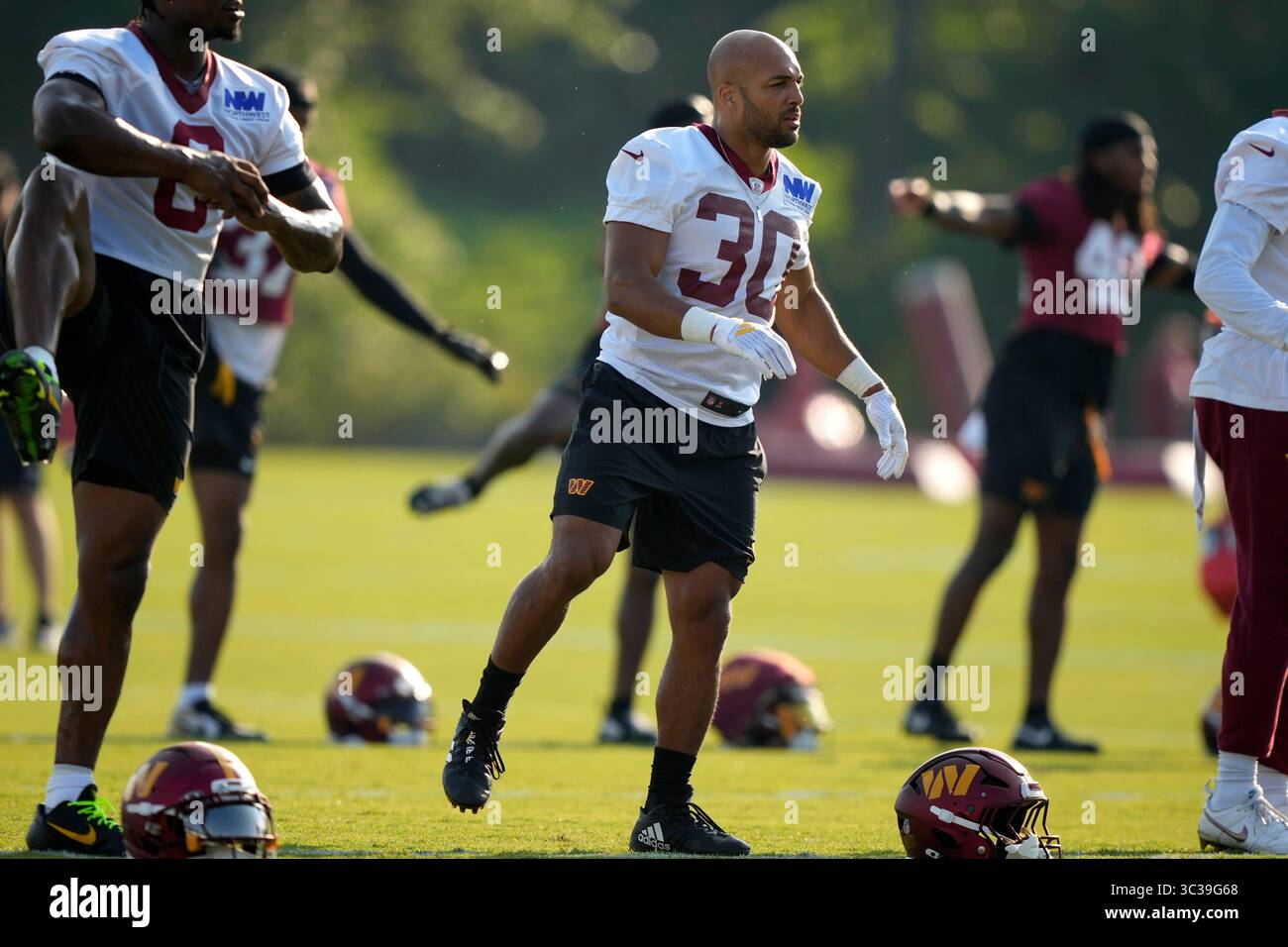 Washington Commanders running back Austin Ekeler (30) warms up during ...