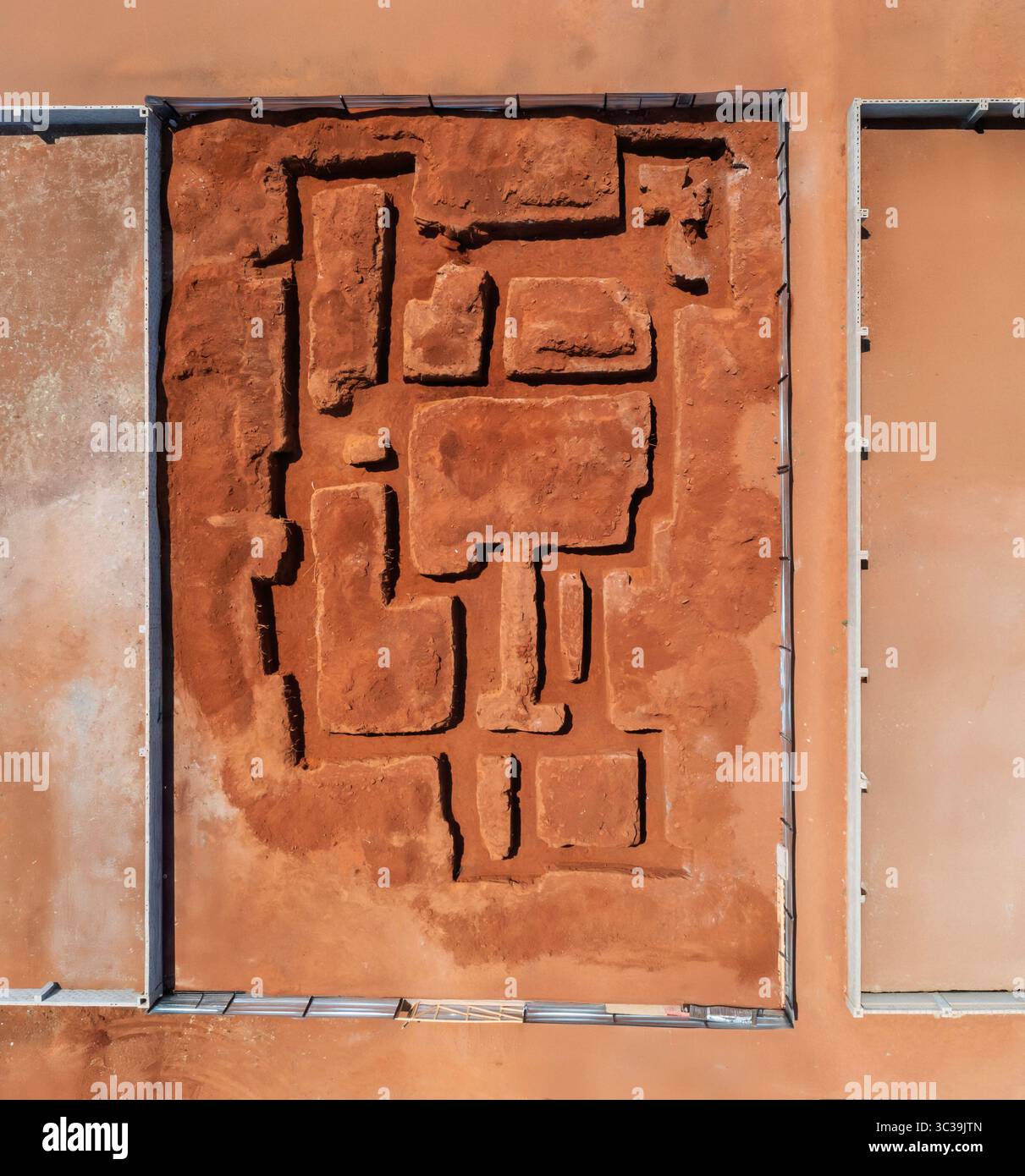 Aerial view of an excavation site for building foundations with ...