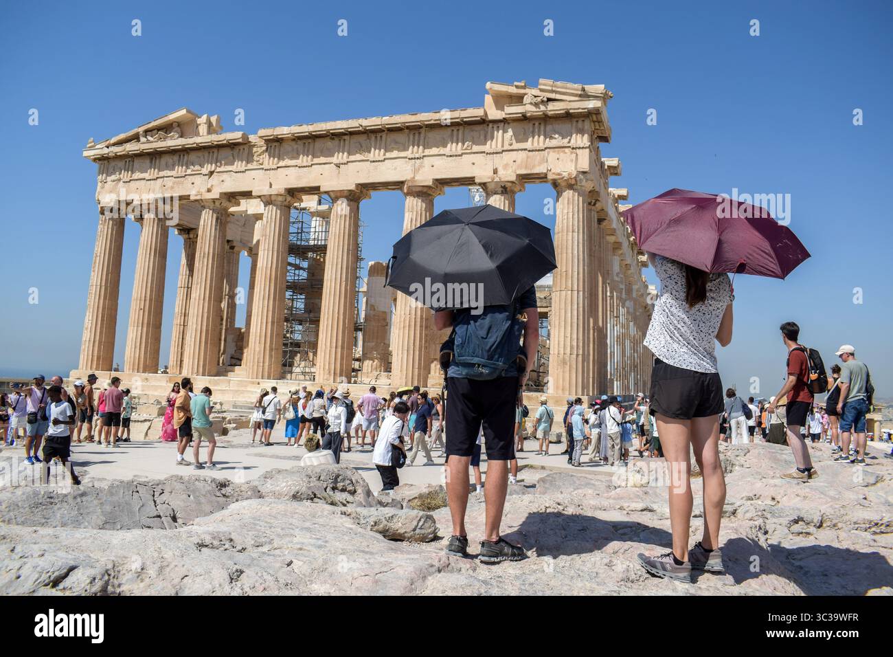 Athens, Greece, 24 July 2025. People visit the Acropolis, some of them ...