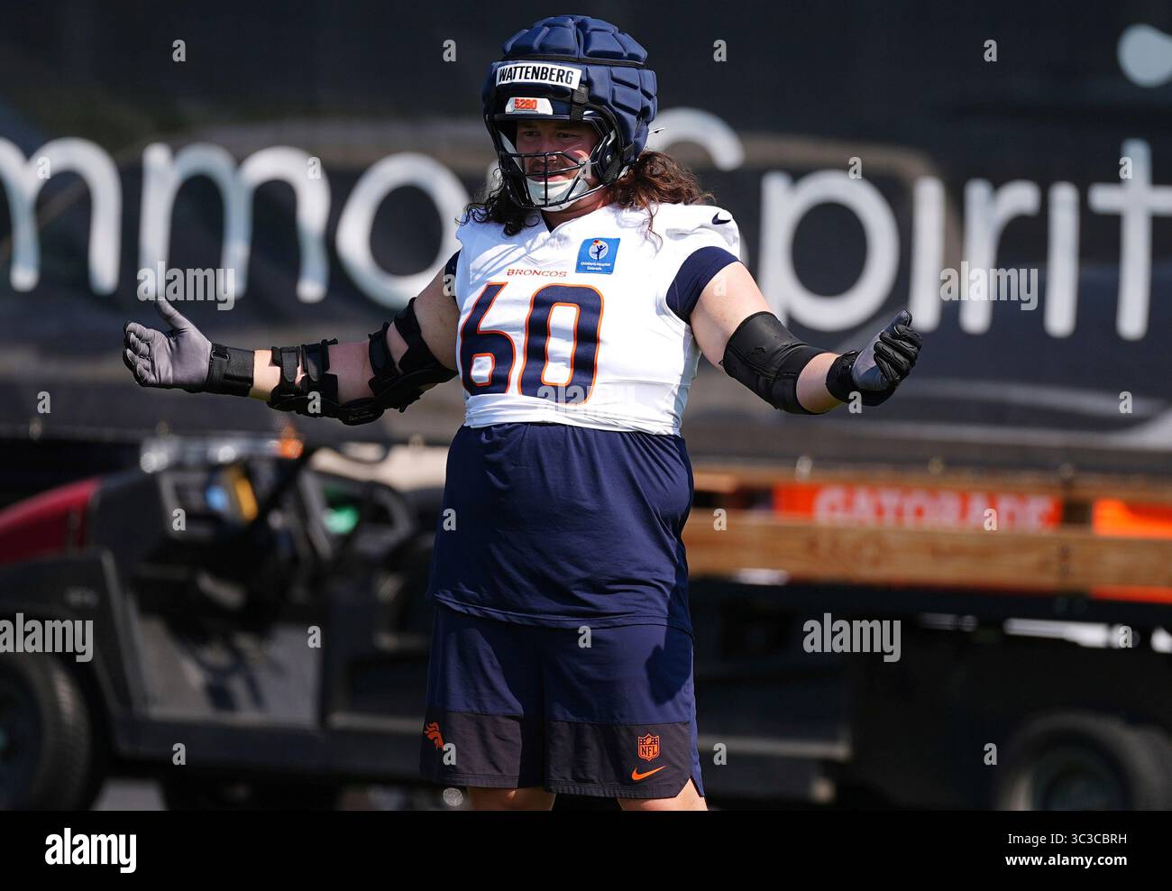 Denver Broncos center Luke Wattenberg stretches during practice at the ...
