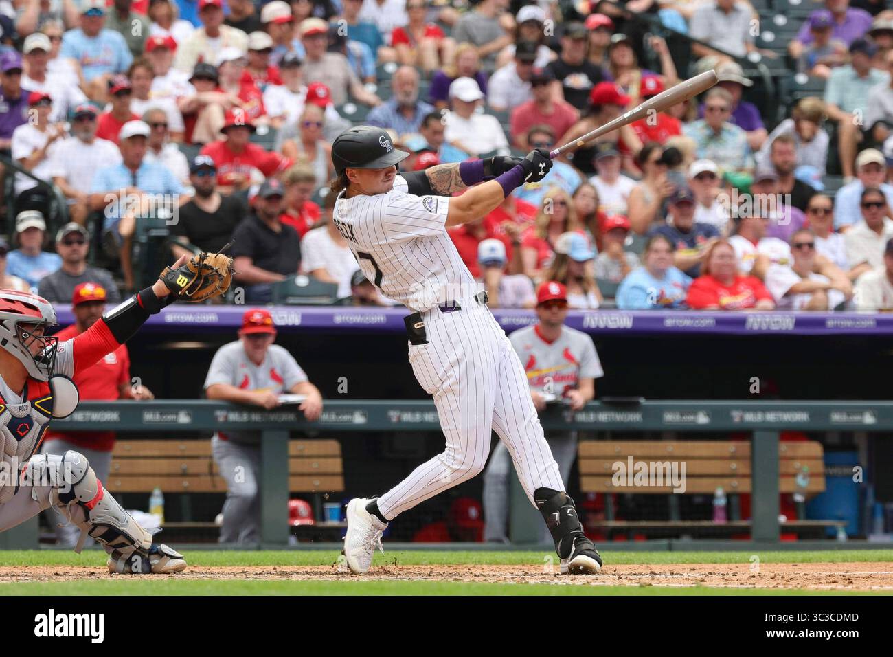 Colorado Rockies outfielder Jordan Beck (27) swings at the pitch in an ...