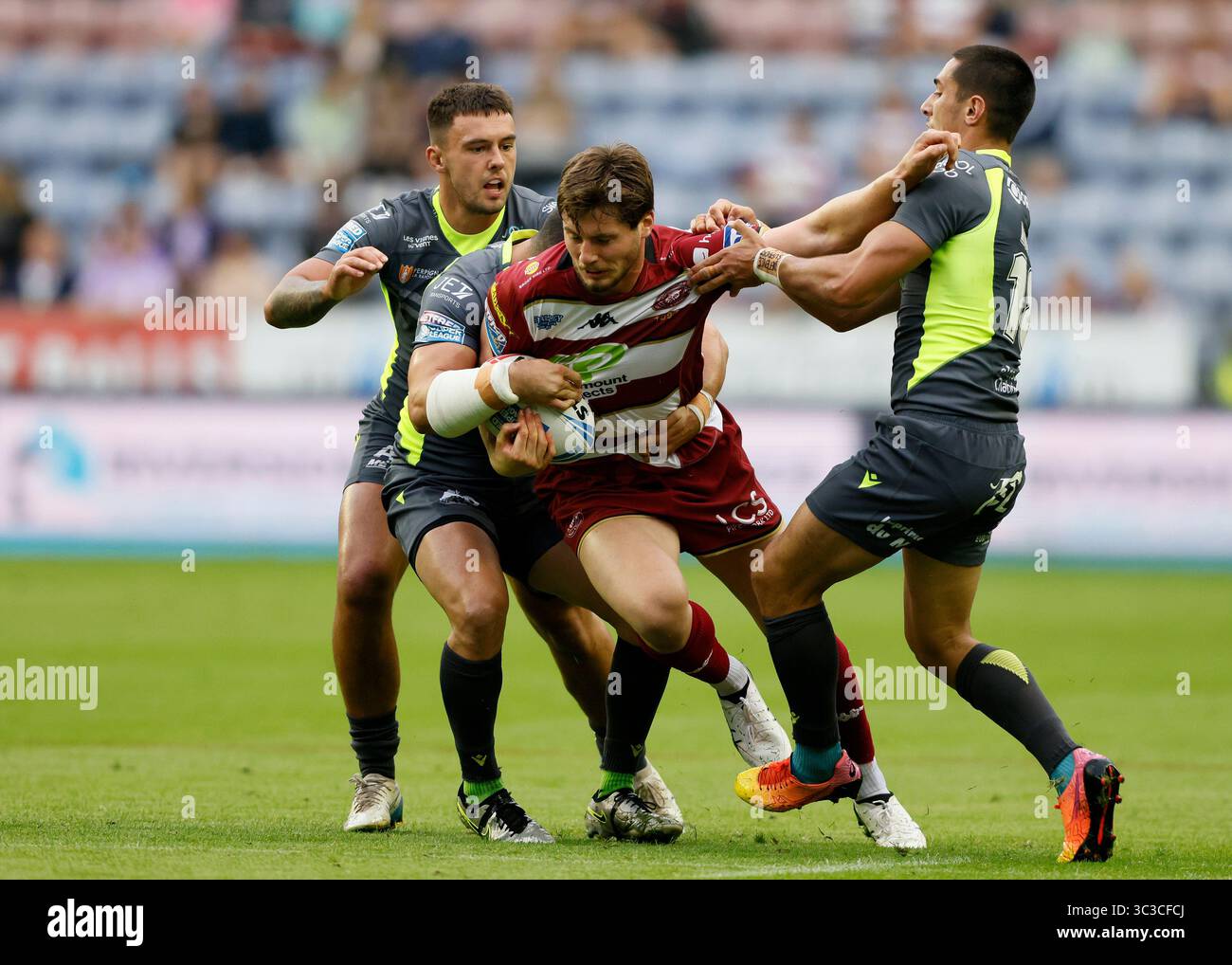 Wigan Warriors Ethan Havard is tackled during the Betfred Super League ...