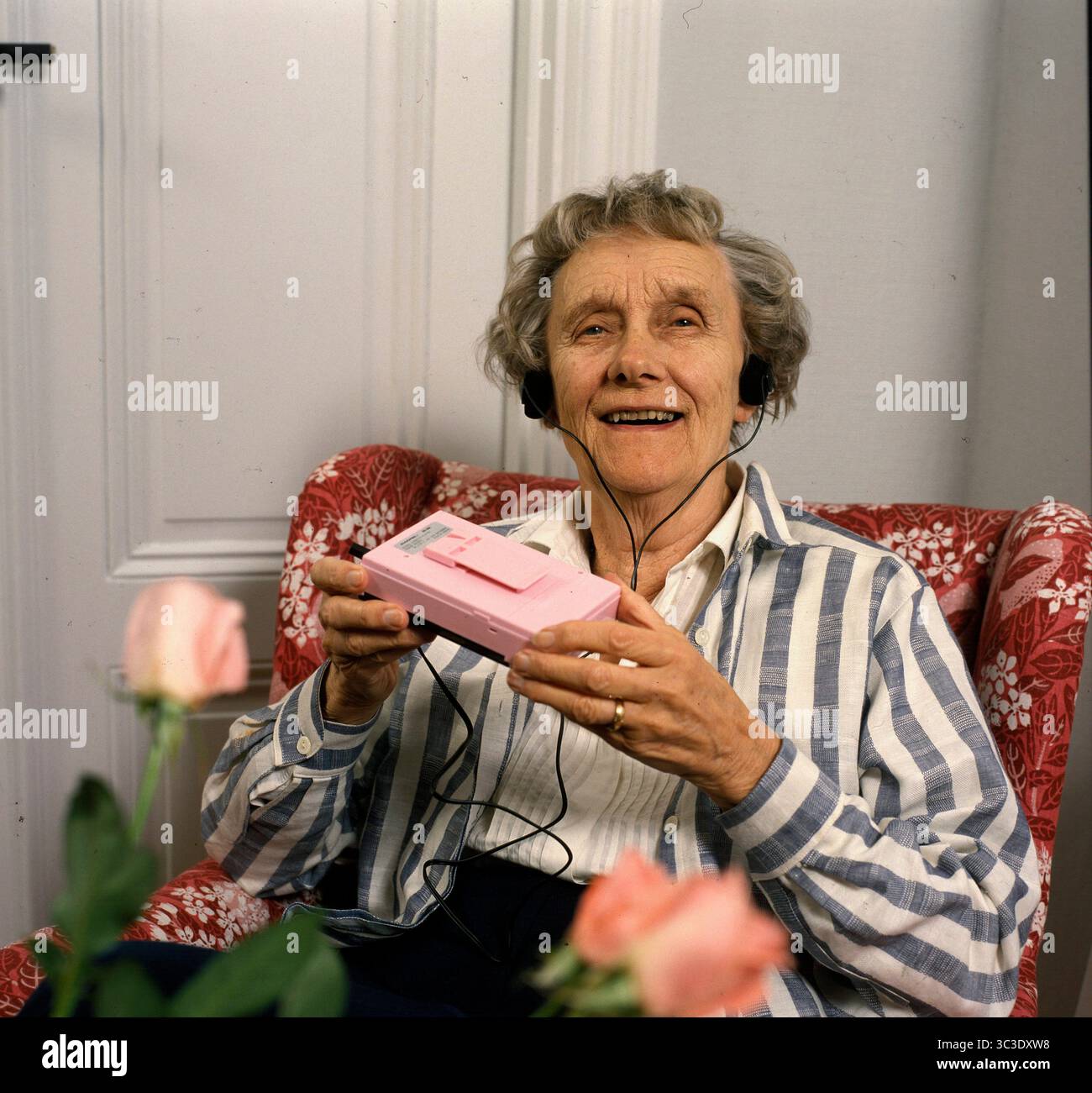 Sweish children's book author Astrid Lindgren listens to walkman in her ...