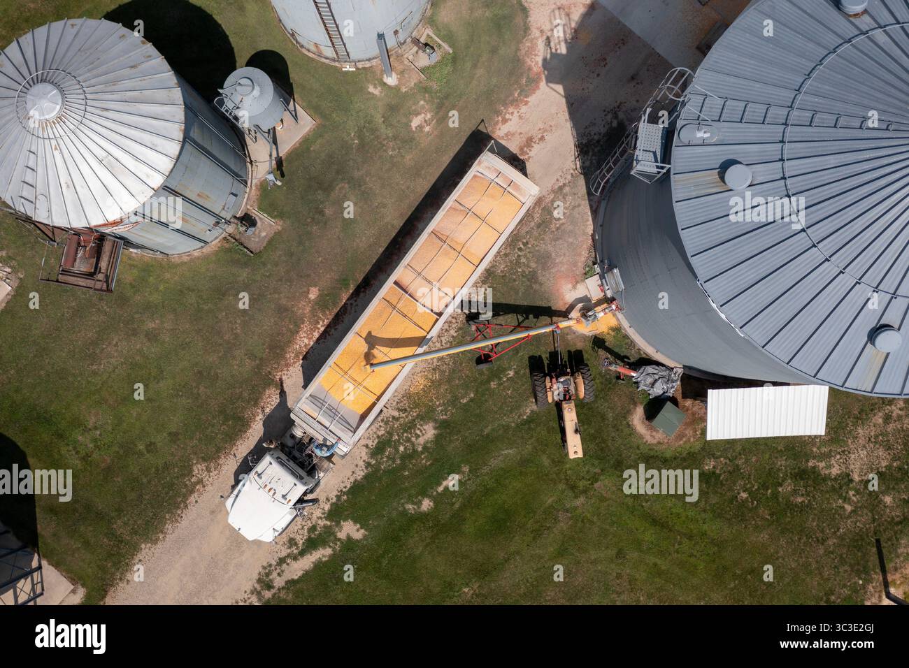 Martin, Michigan - Corn is loaded onto a truck from grain storage bins ...