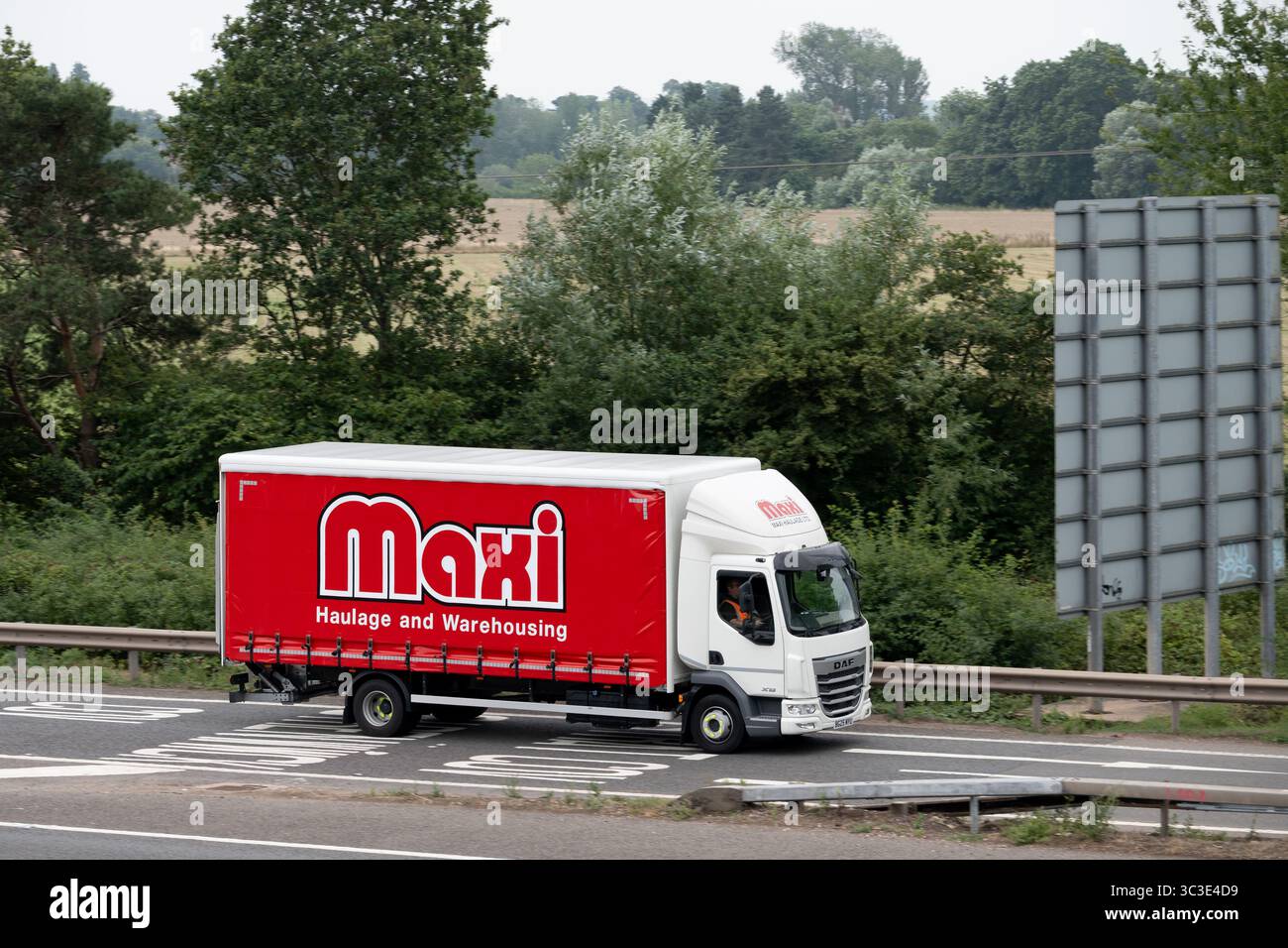 Maxi lorry leaving the M40 motorway at Junction 15, Warwickshire, UK ...