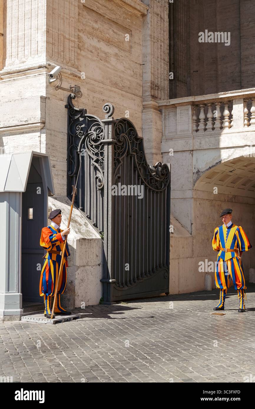 Two pontifical Swiss guards at an entrance to Vatican City, Rome, Italy ...