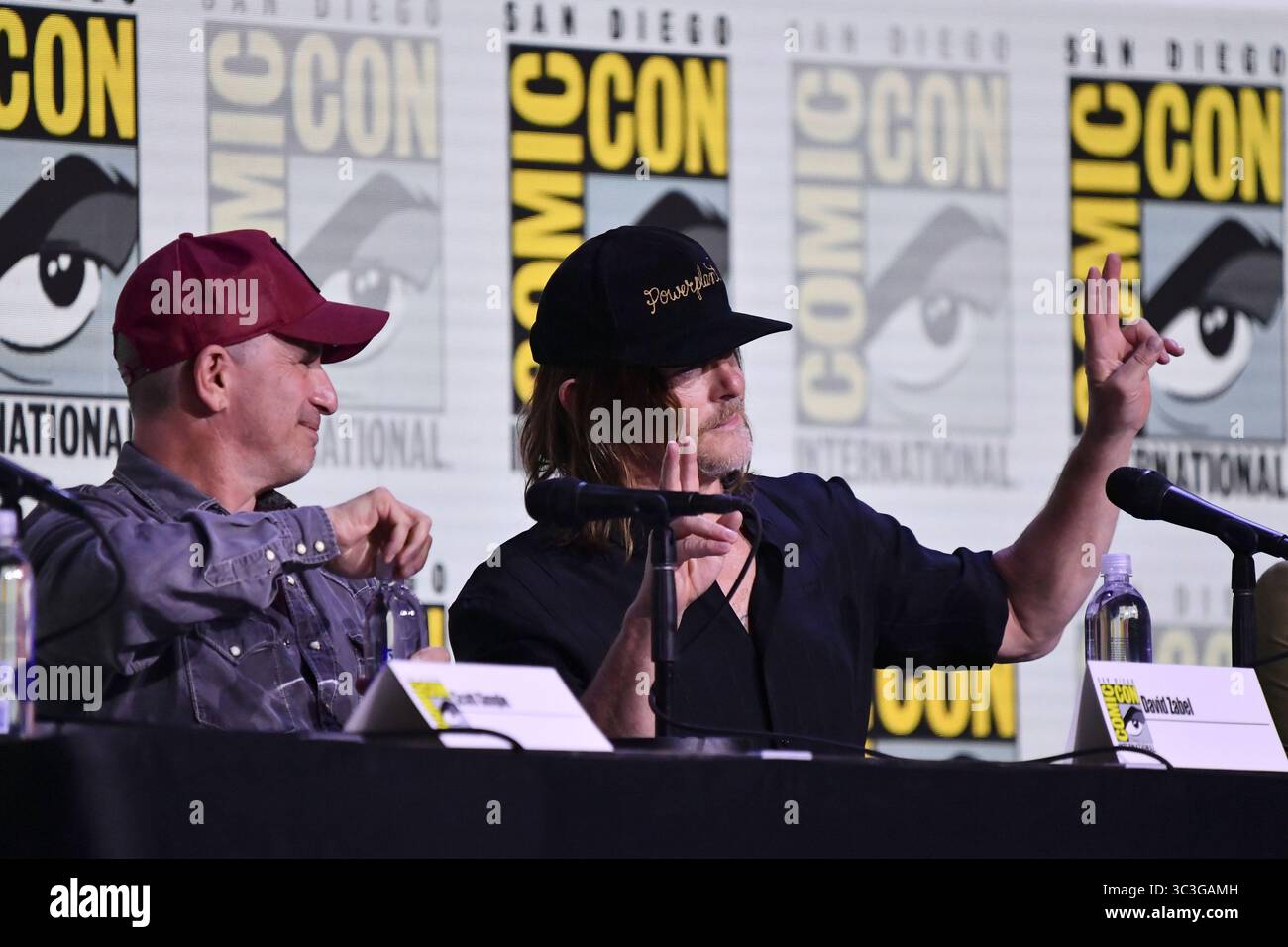 David Zabel, left, and Norman Reedus attend a panel for "The Walking ...