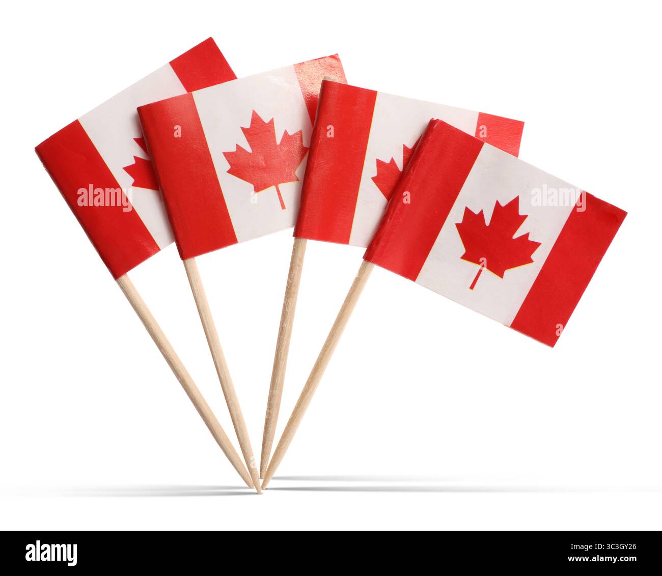 Small paper flags of Canada on white background Stock Photo - Alamy
