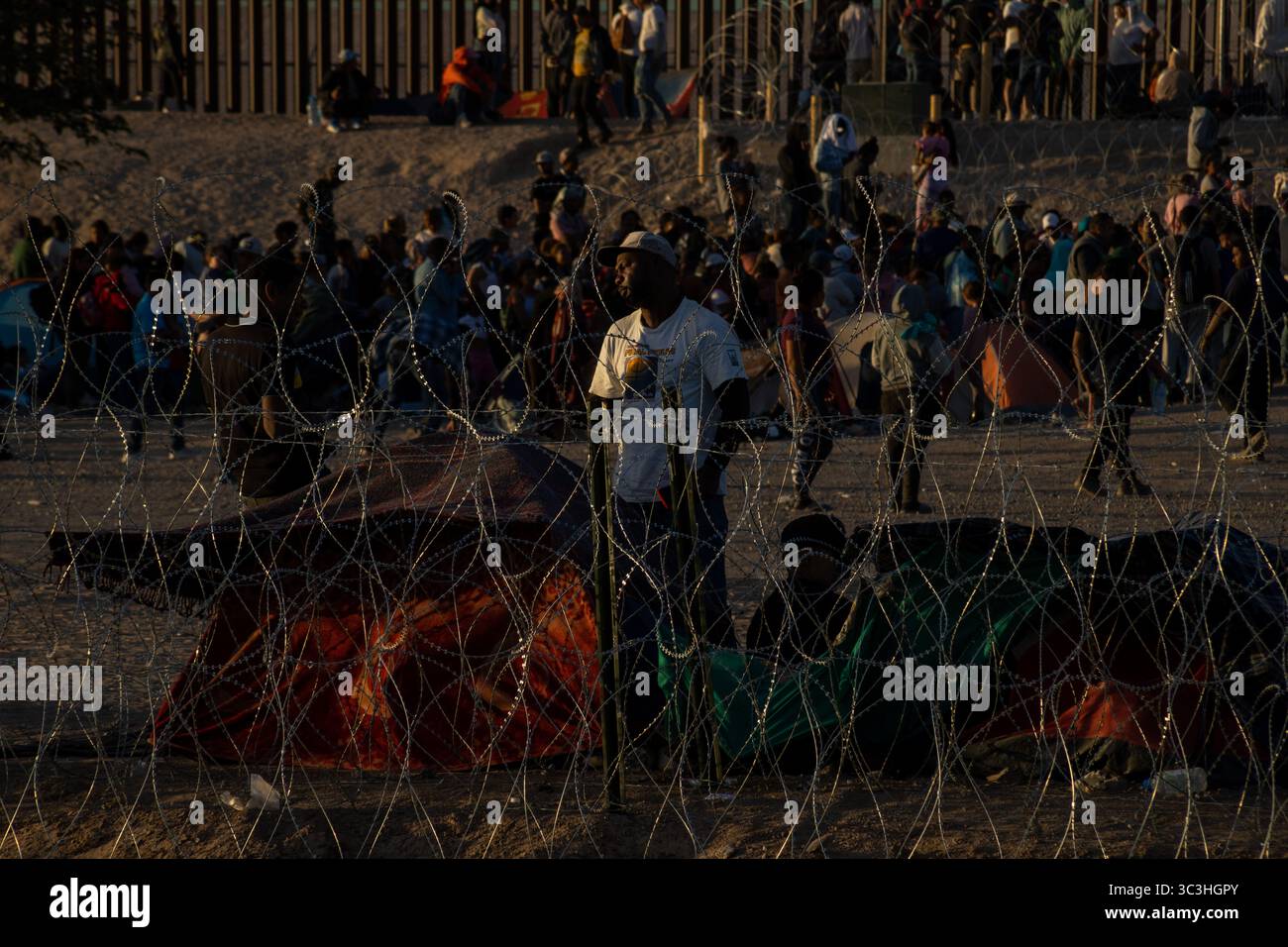 Crowds gather at the US-Mexico border in Ciudad Juarez, spotlighting ...