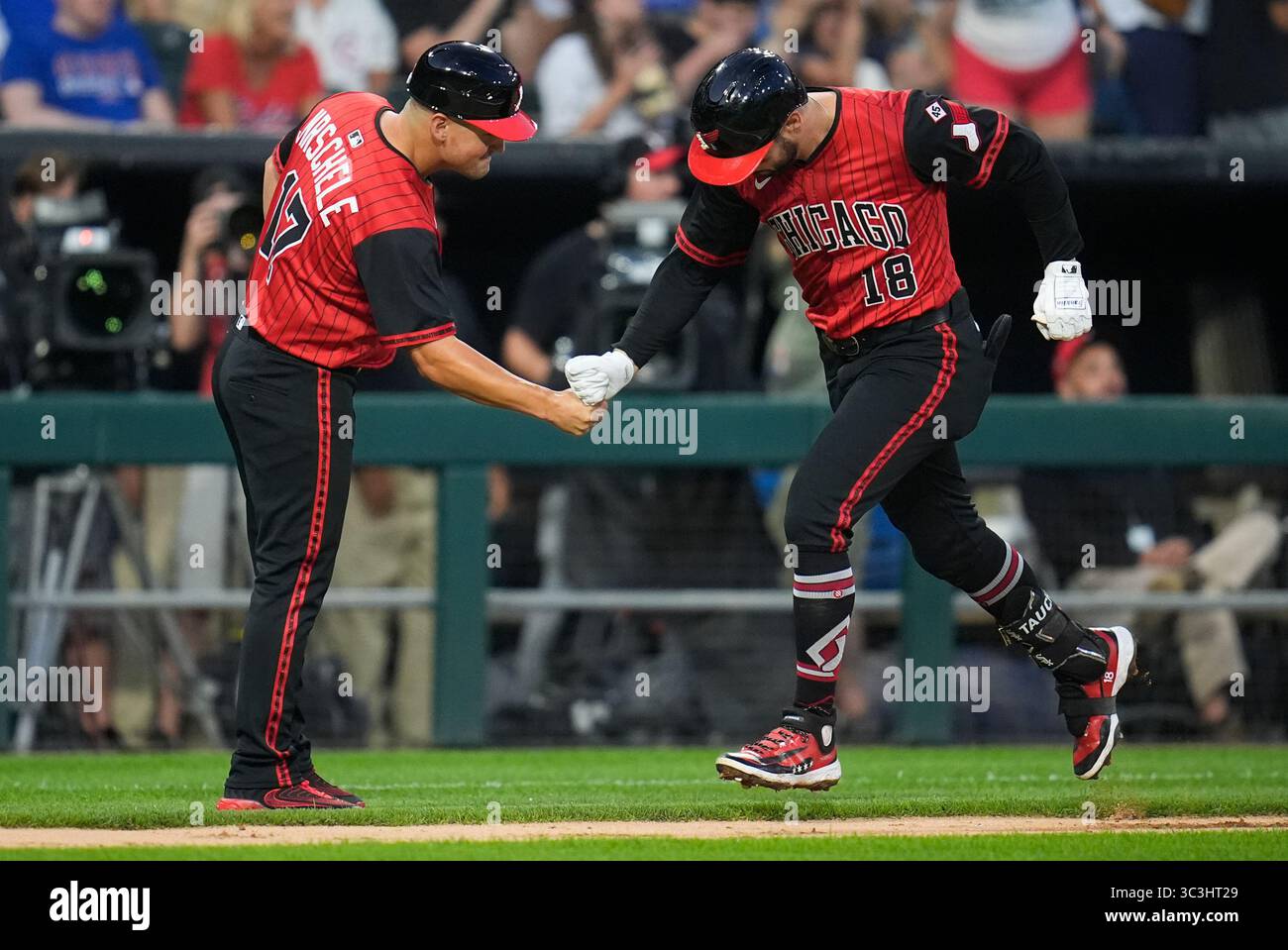 Chicago White Sox's bumps fists with Mike Tauchman (18), right, bumps ...