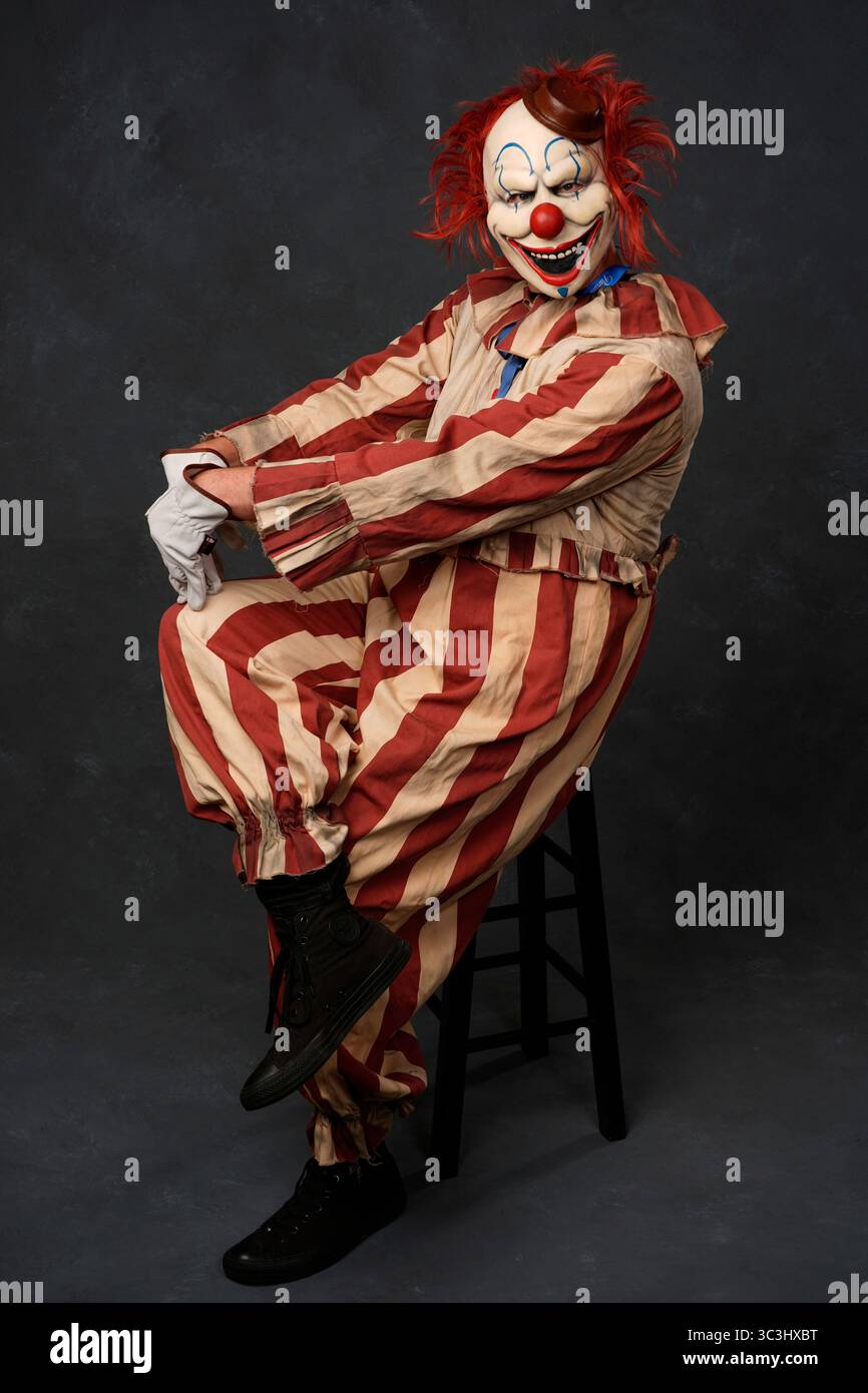 A person dressed as the character Frendo the clown poses for a portrait ...