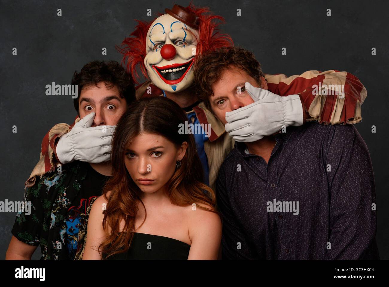 Adam Cesare, from left, Katie Douglas, a person dressed as the ...