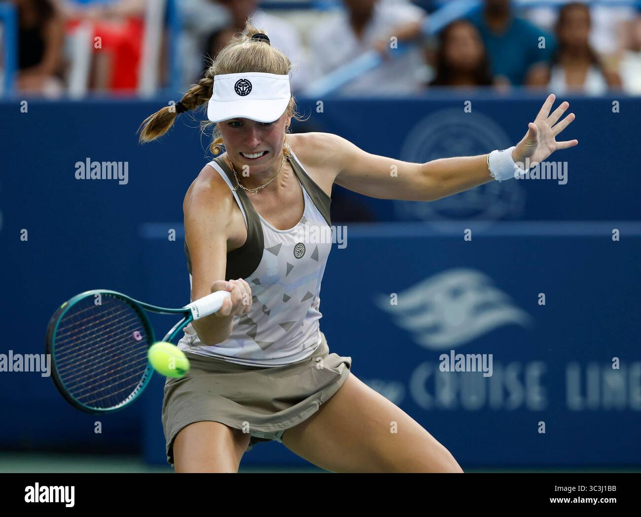 July 25, 2025: Magdalena Frech hits a shot in her match against Elena ...
