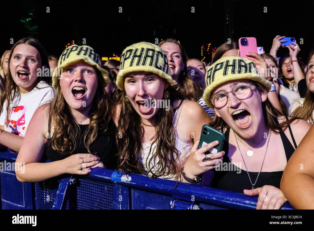 Copenhagen, Denmark. 25th July, 2025. Concert goers cheer during a ...