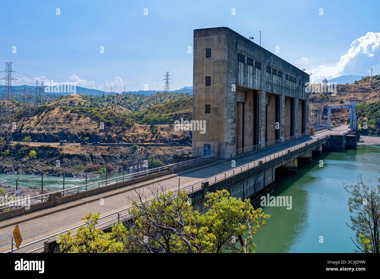 The Keswick Dam impounds the Sacramento River at Redding in California ...