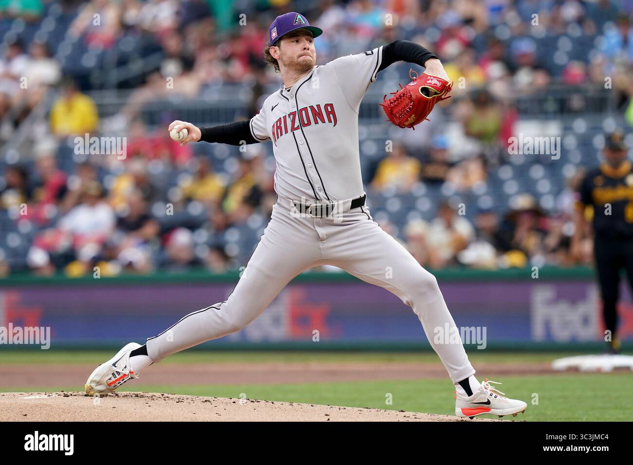 Arizona Diamondbacks pitcher Ryne Nelson delivers during the first ...