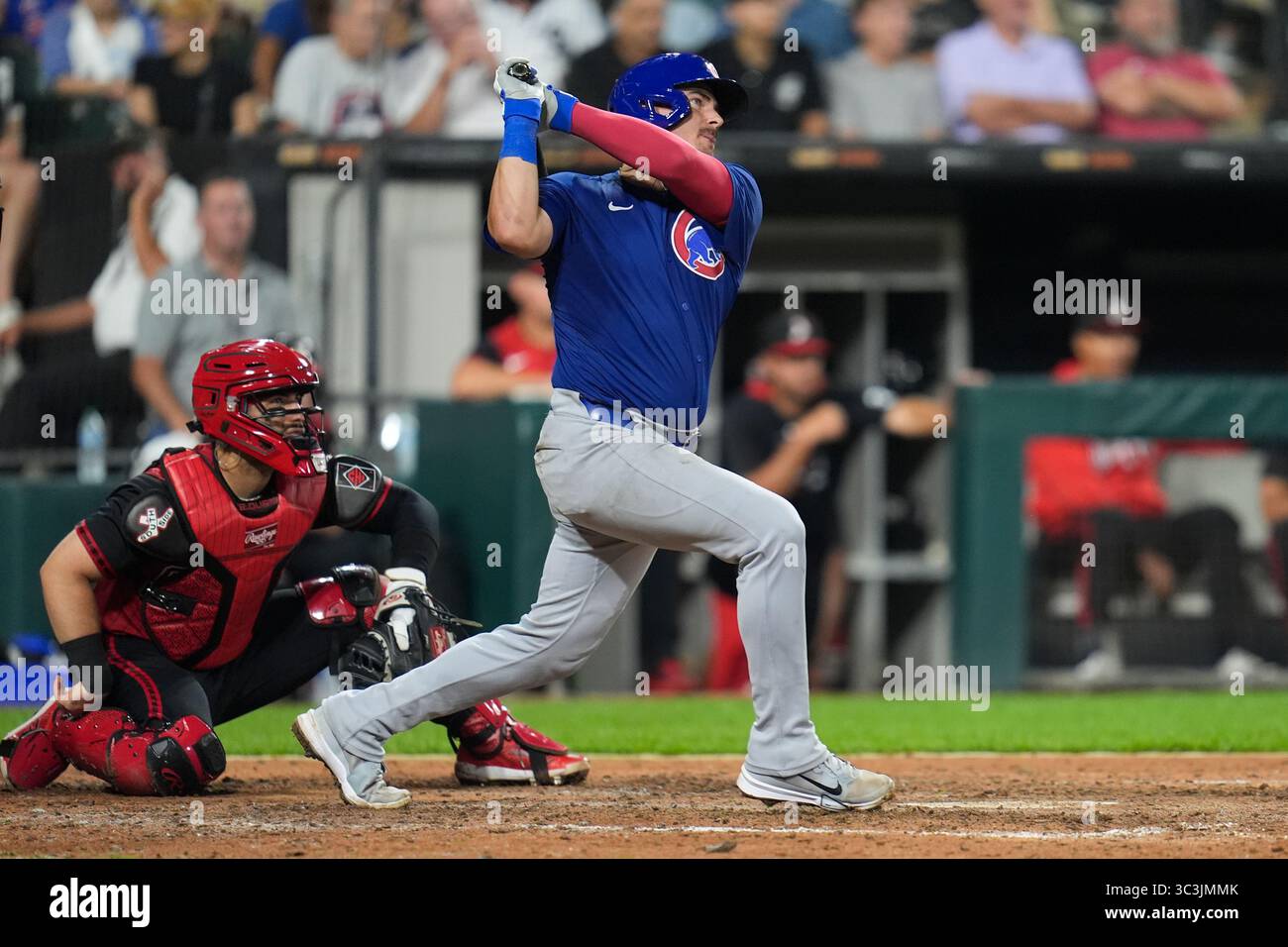 Chicago Cubs' Reese McGuire hits a three-run home run during the ...