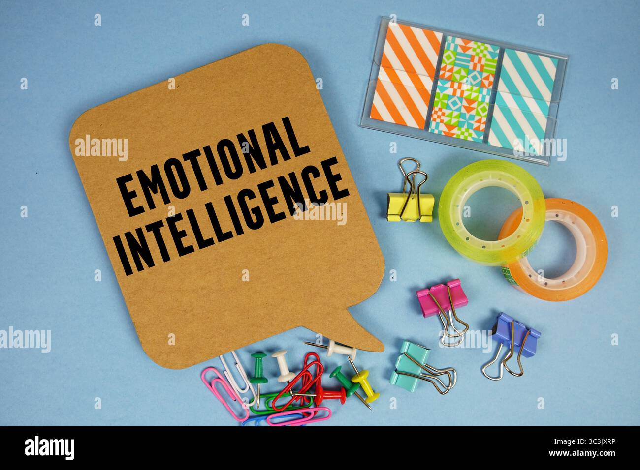 Emotional Intelligence text with stationery on blue background Stock ...