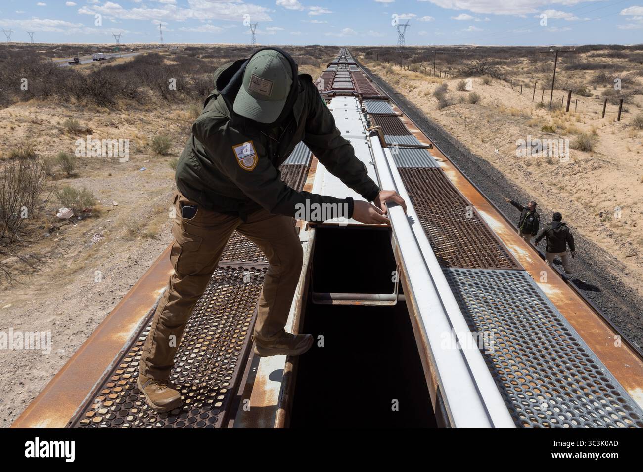 Border patrol inspects a train near Ciudad Juarez, showcasing ...