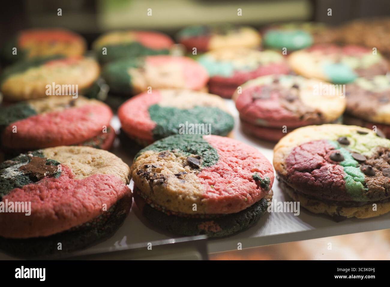 Colorful cookies displayed in a bakery shop Stock Photo - Alamy