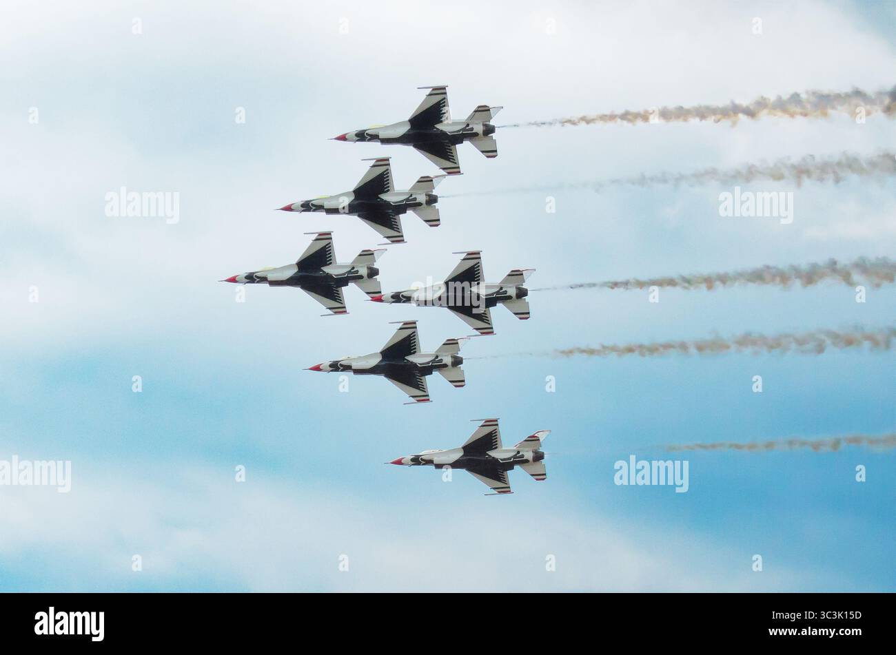 The U.S. Air Force Thunderbirds fly in diamond formation with smoke ...