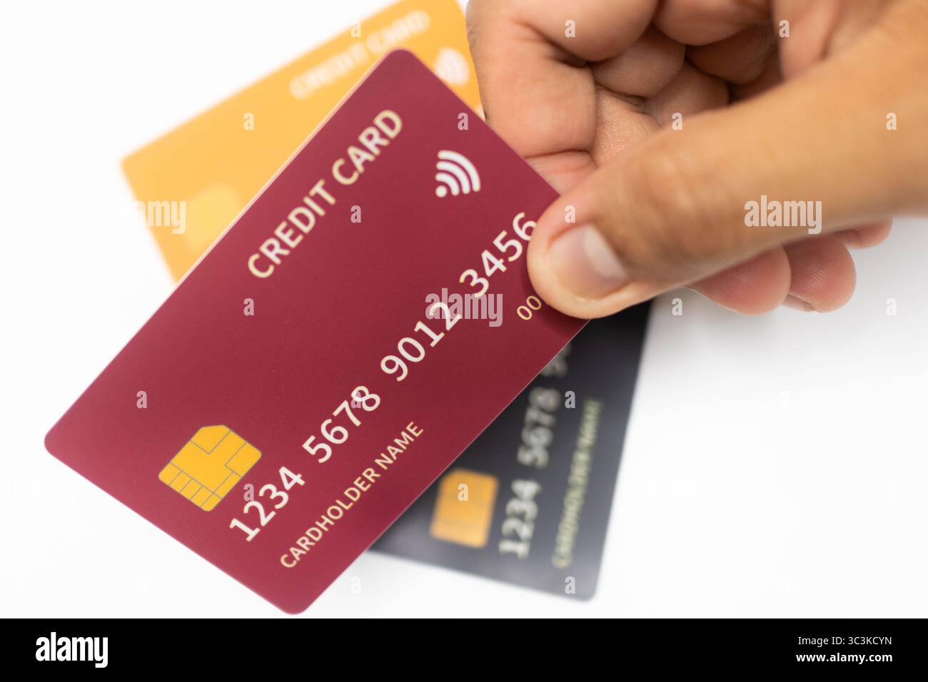 Credit card held in hi-res stock photography and images - Alamy