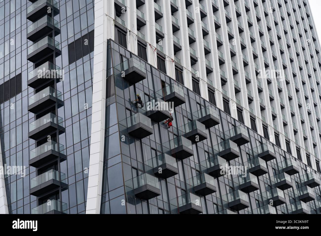 People seen cleaning windows of the modern high-rise Marriott hotel on ...