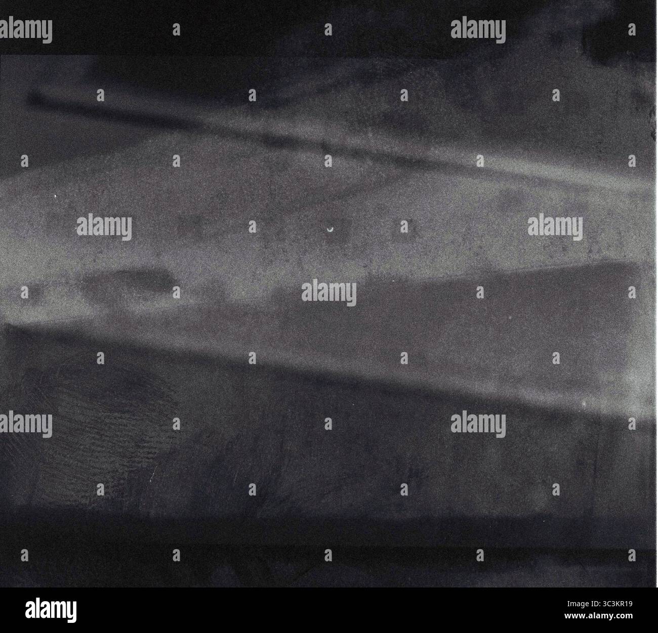 A photo showcasing a 400 ISO medium format 120 roll film grain texture ...