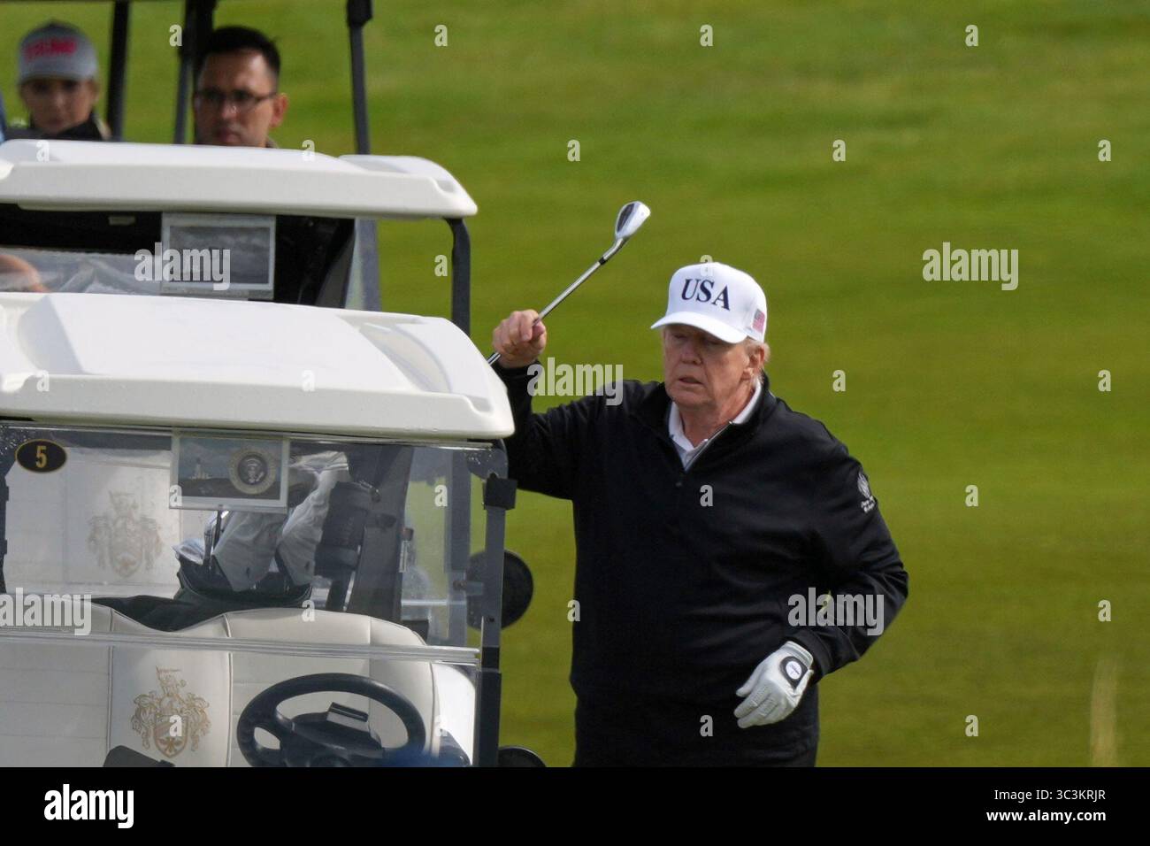 President Donald Trump plays golf at the Trump Turnberry golf course in ...