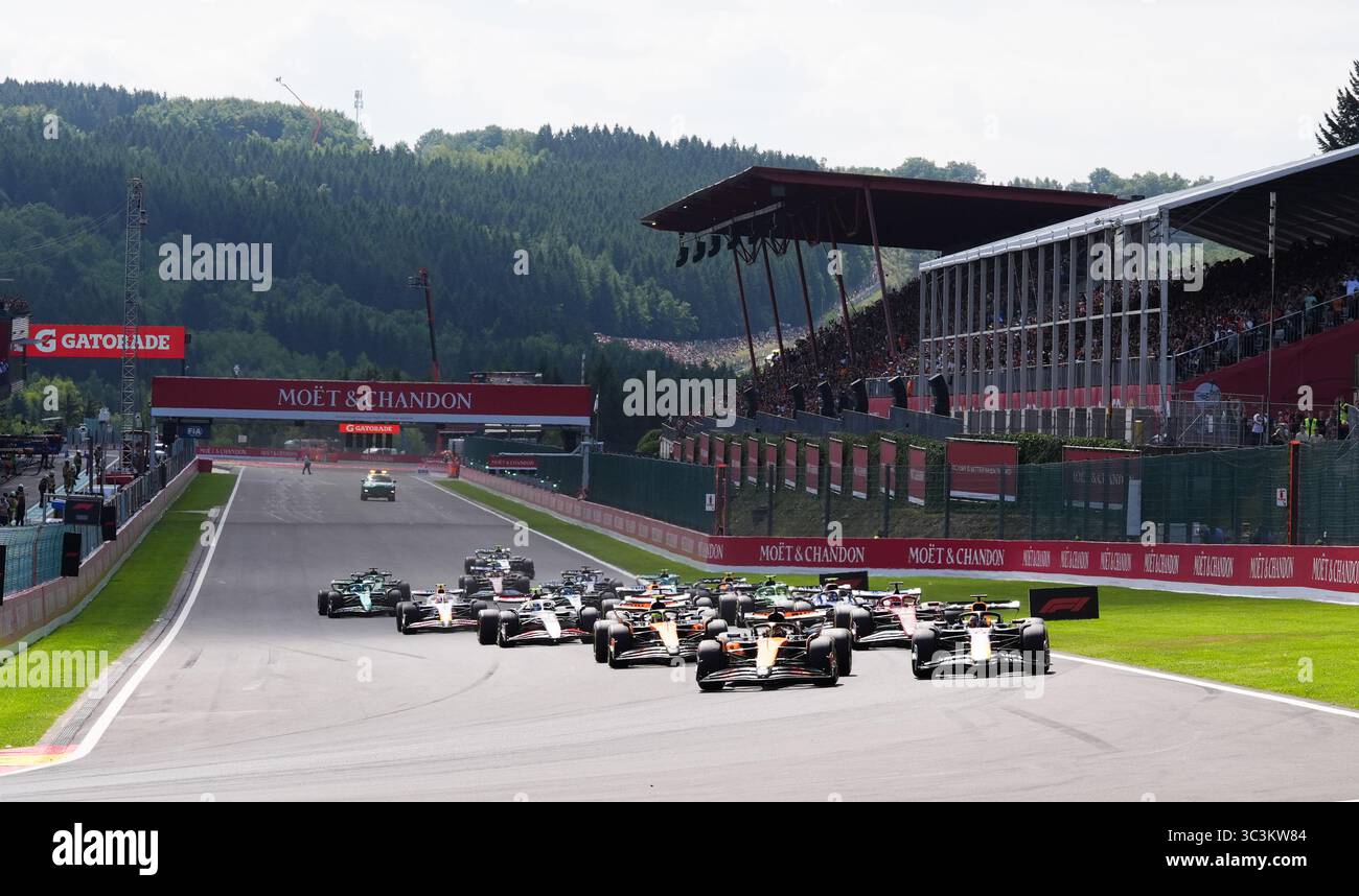McLaren driver Oscar Piastri leads Red Bull driver Max Verstappen into ...