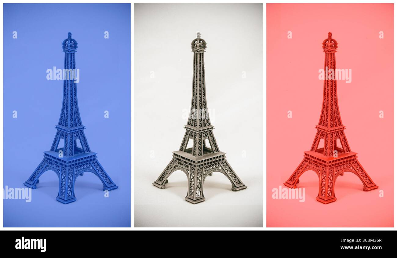 Three multicolored Eiffel Tower models on french flag. Dust and ...