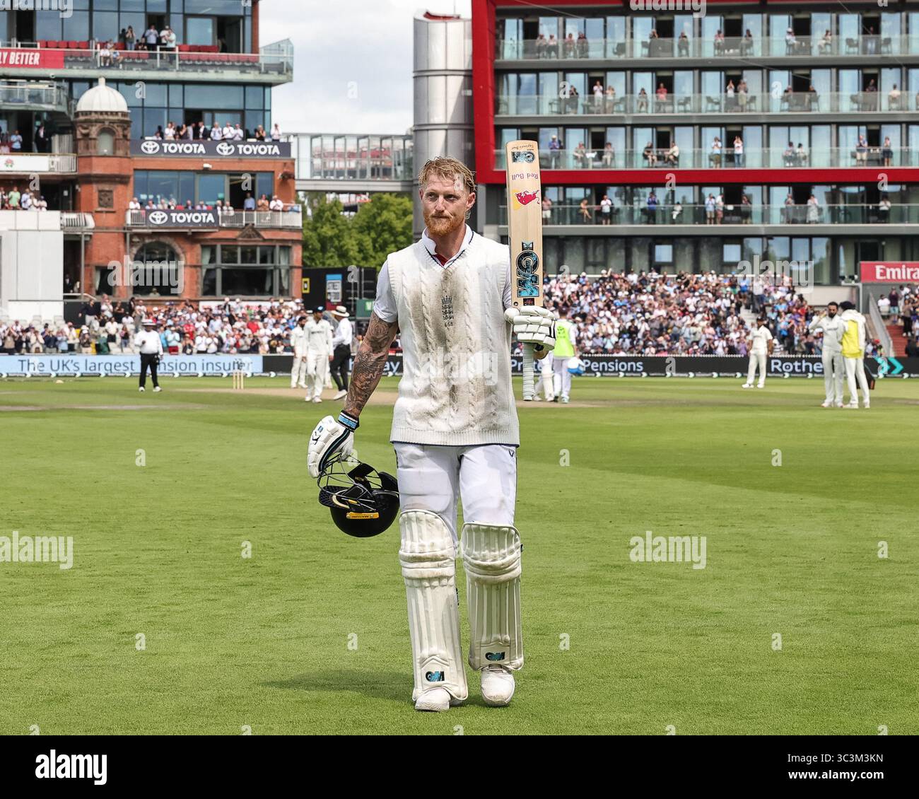 England captain Ben Stokes leaves the field of platy to a standing ...