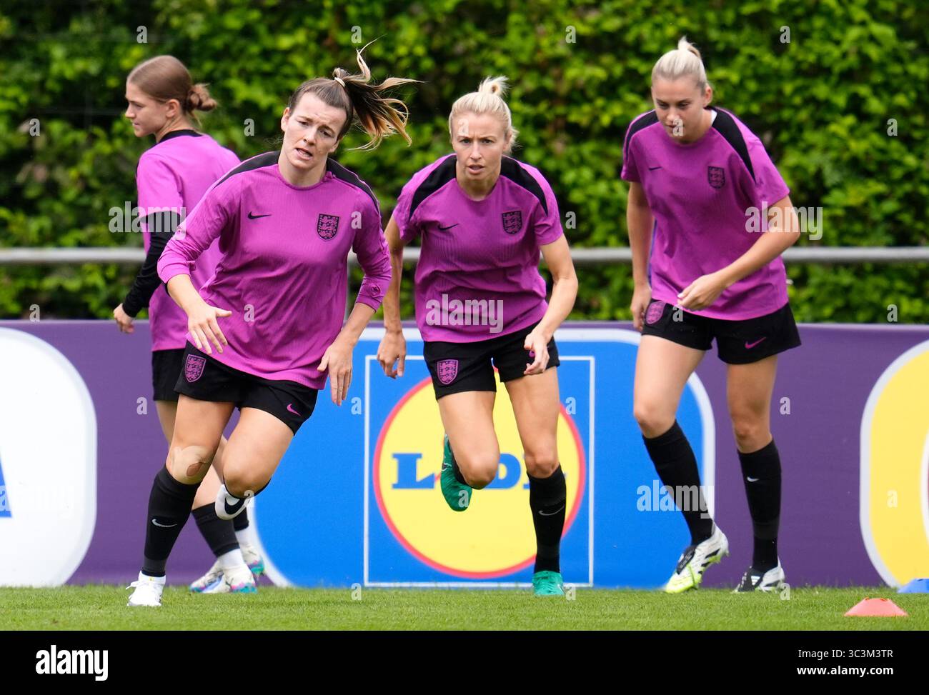 England's Leah Williamson (centre) and team-mates during a training ...