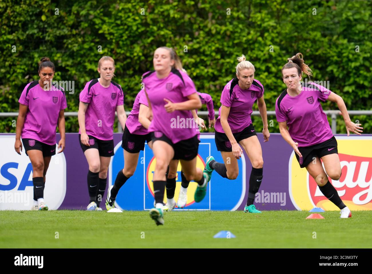 England's Leah Williamson (second right) and team-mates during a ...
