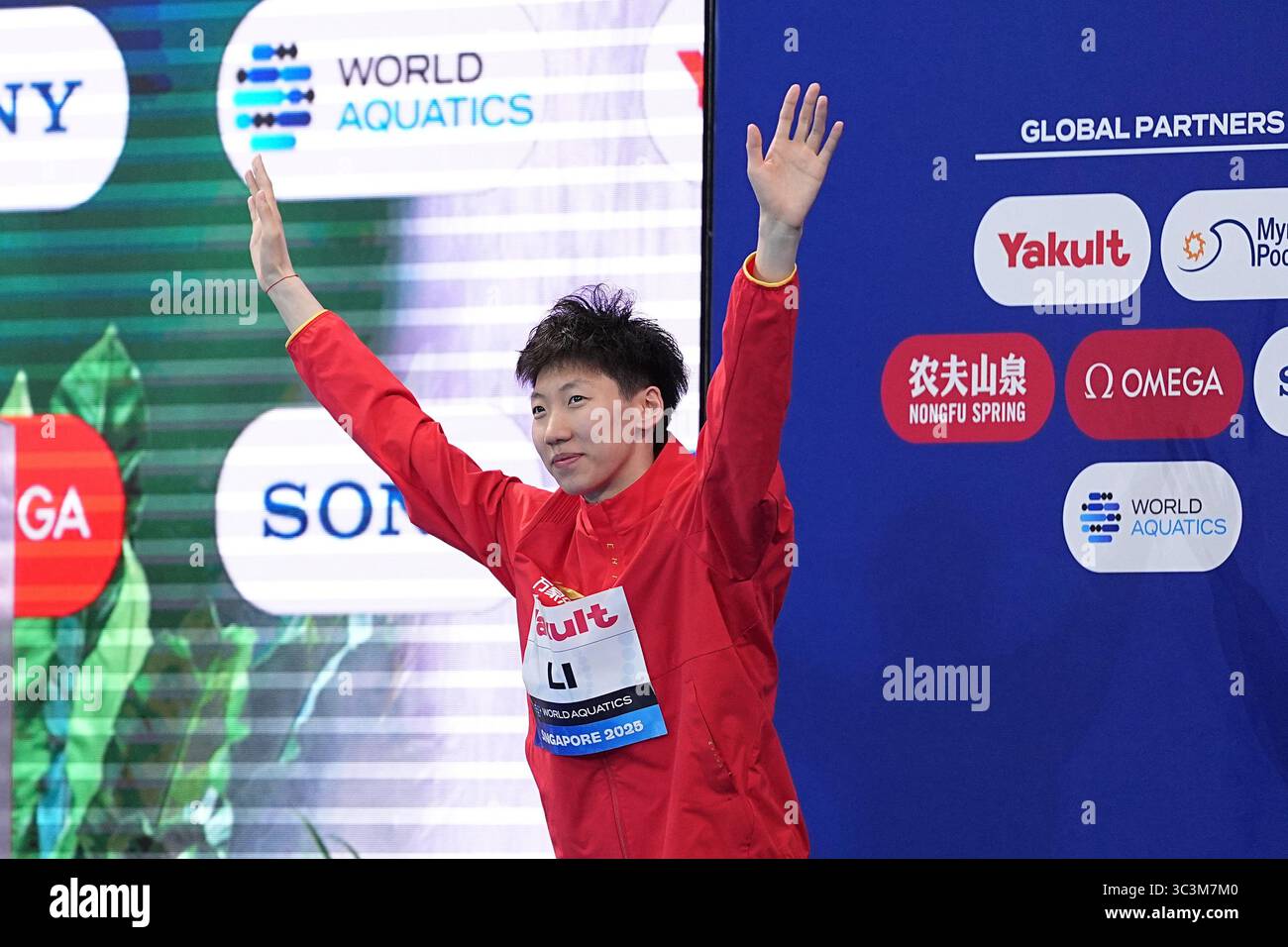 Silver medalist Li Yajie of China celebrates on the podium after the ...