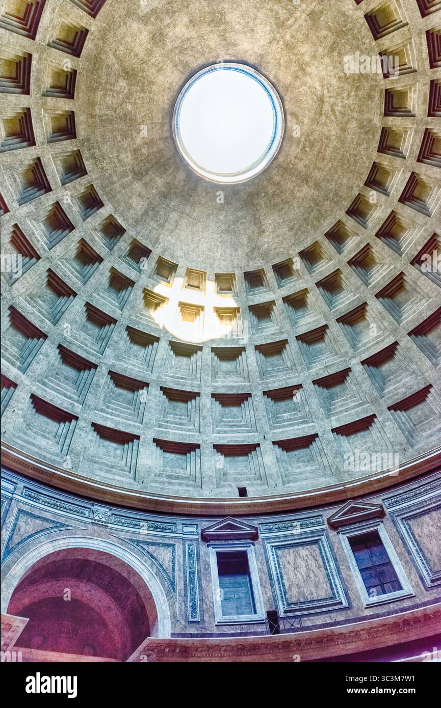 View inside of the Pantheon's dome in Rome, Italy. The famous opening at the top is called the ...