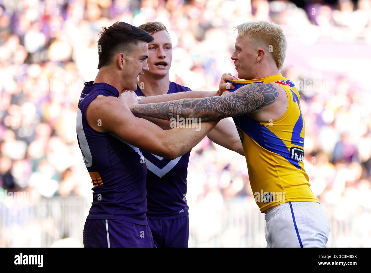 Patrick Voss of the Dockers and Ryan Maric of the Eagles get into a scuffle during the AFL Round ...