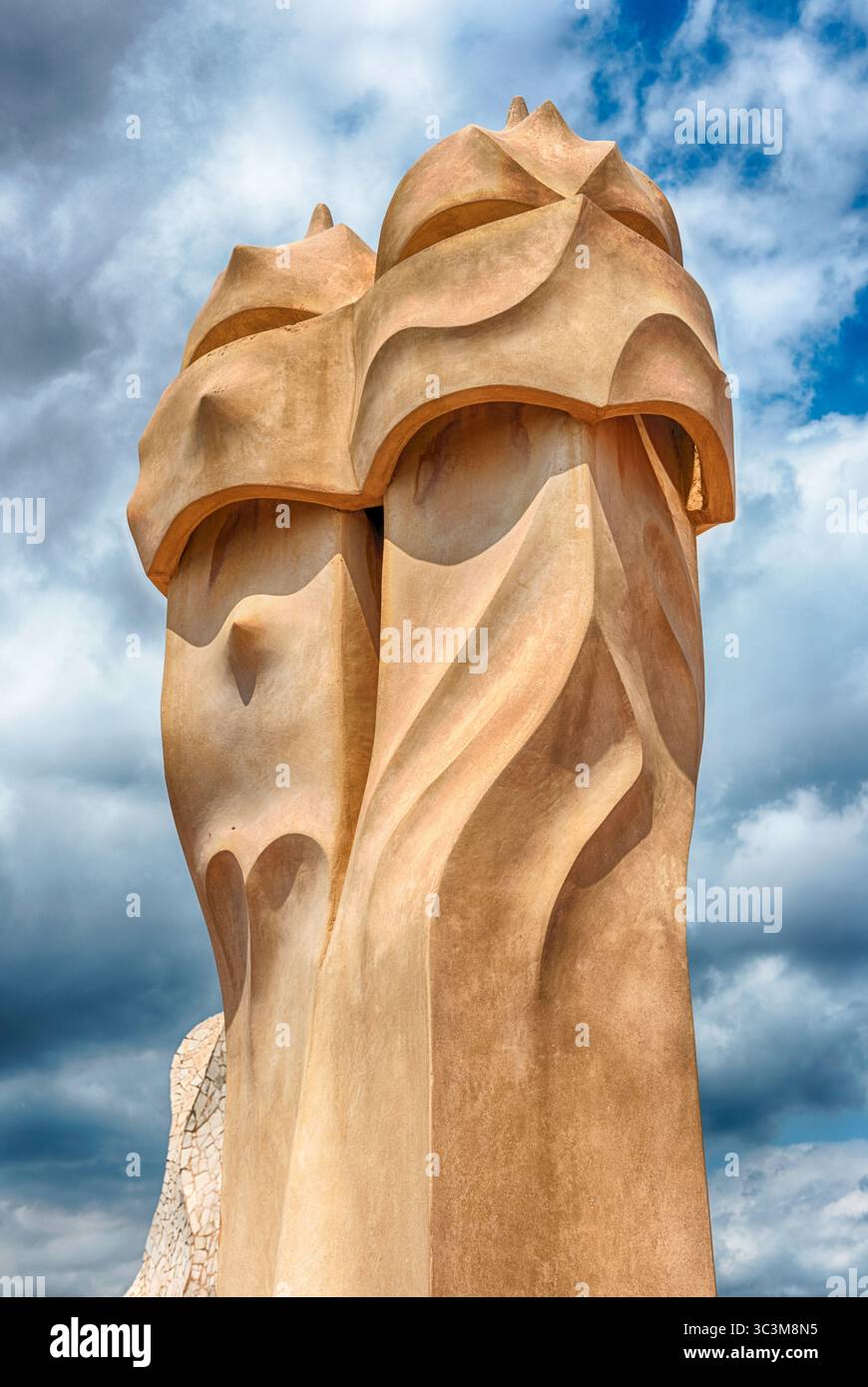 BARCELONA - AUGUST 9: Iconic chimneys, aka witch scarers, at the modernist Casa Mila, aka La ...